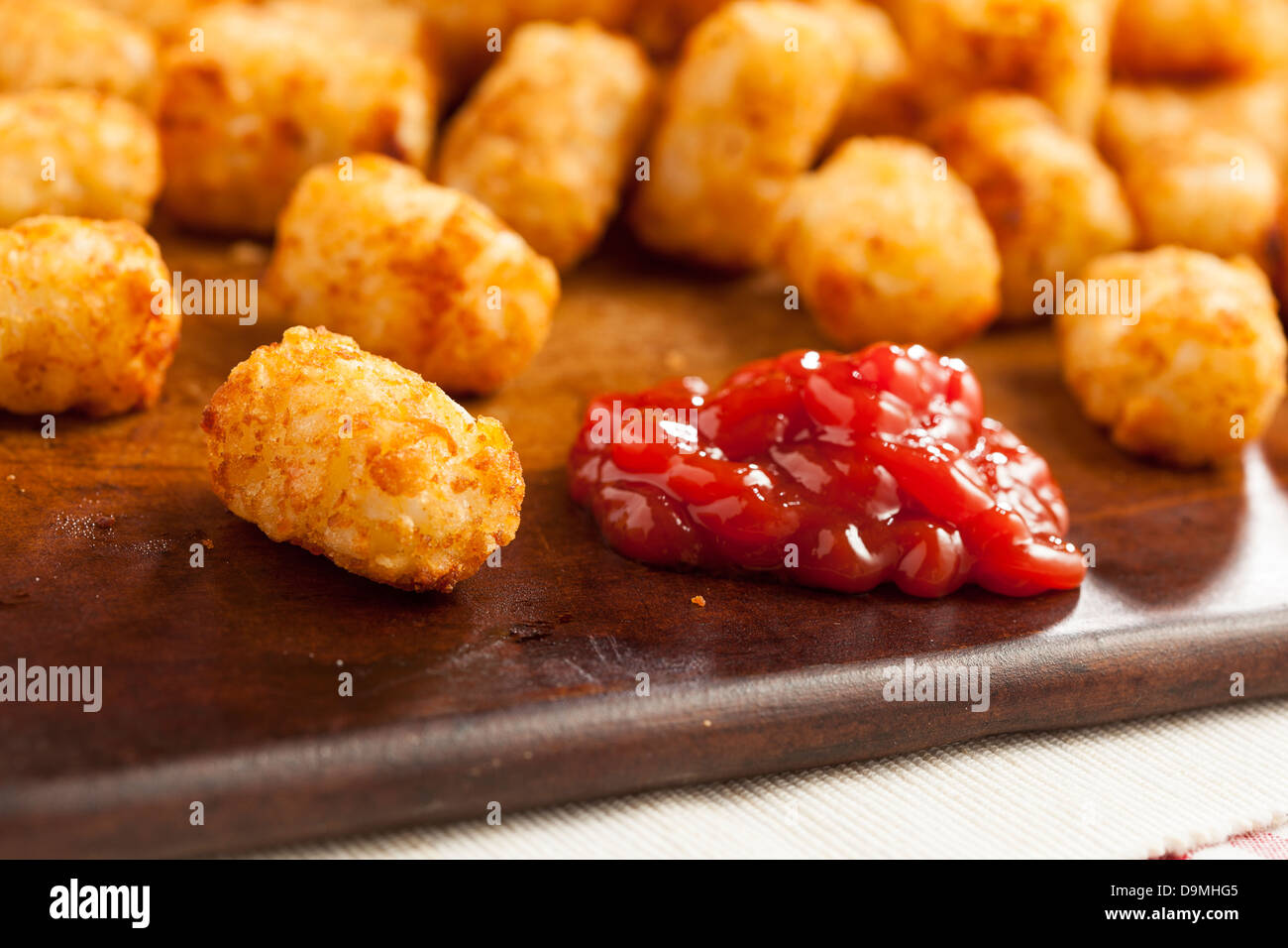 Organic Fried Tater Tots made from fried potato Stock Photo - Alamy
