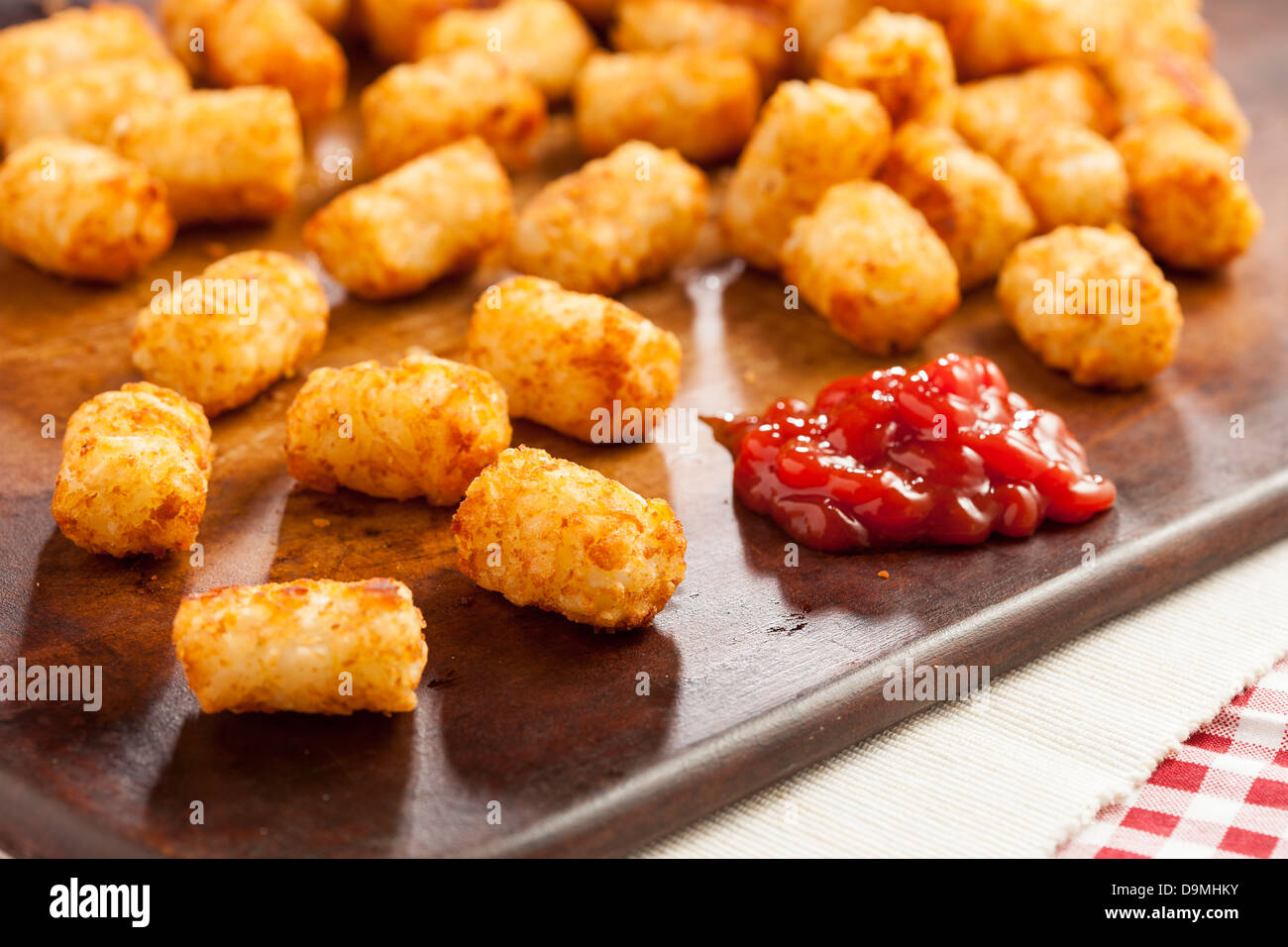 Organic Fried Tater Tots made from fried potato Stock Photo - Alamy