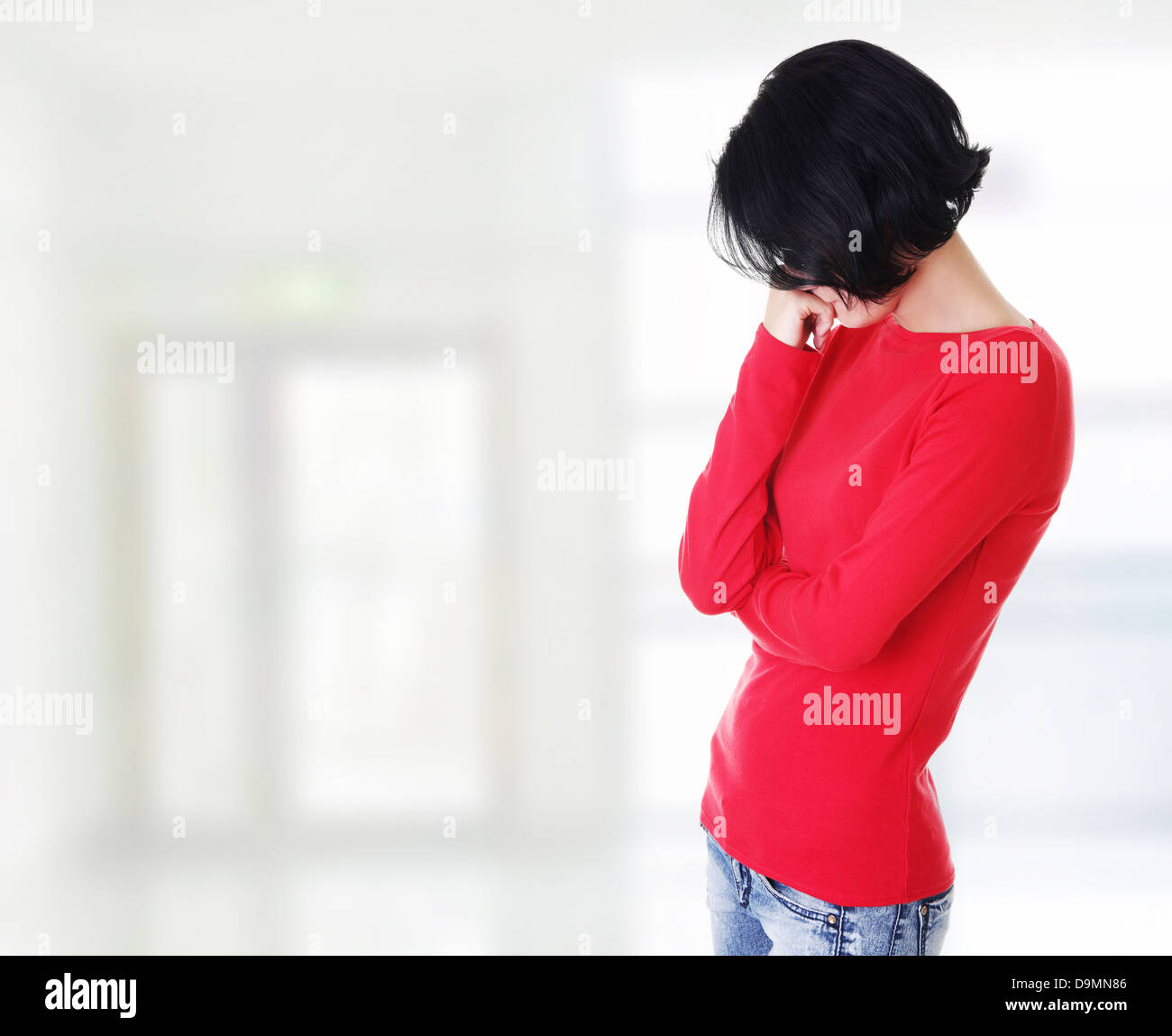 Thoughtful young woman with problem Stock Photo - Alamy