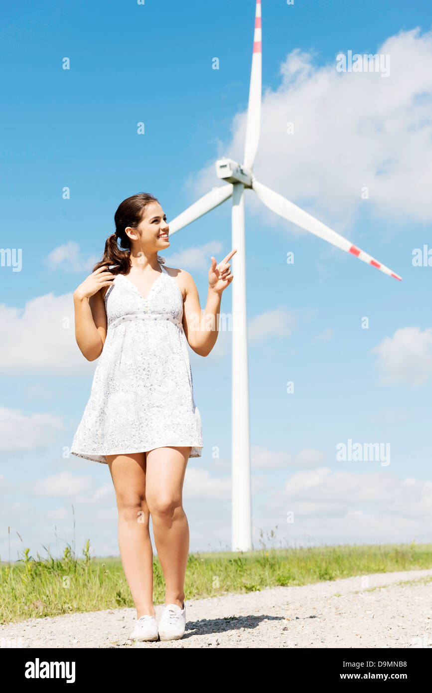 Happy teen girl next to wind turbine.Eco energy concept Stock Photo - Alamy Happy teen girl next to wind turbine.Eco energy concept Stock Photo - Alamy