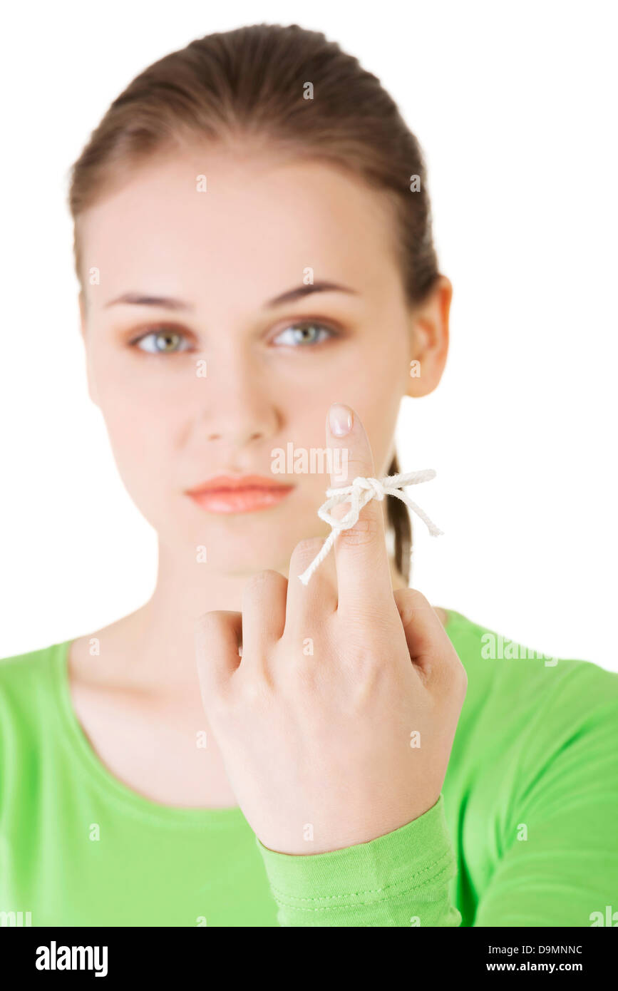 Woman trying to remember what the piece of string round her finger was ...