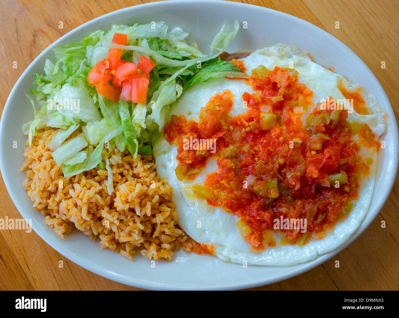 Mexican style eggs or Huevos Rancheros Stock Photo - Alamy