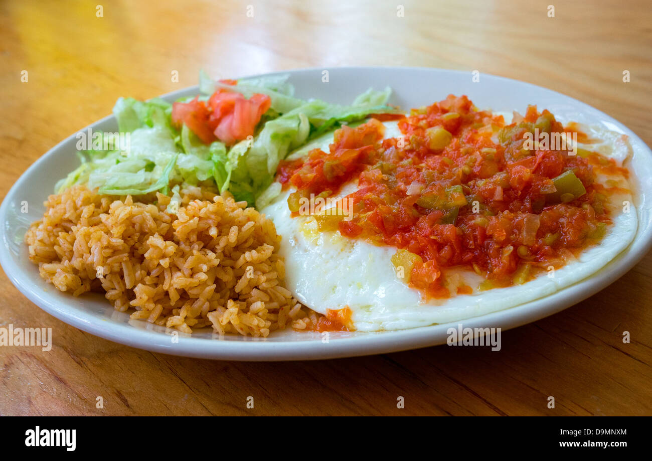 Mexican style eggs or Huevos Rancheros Stock Photo - Alamy