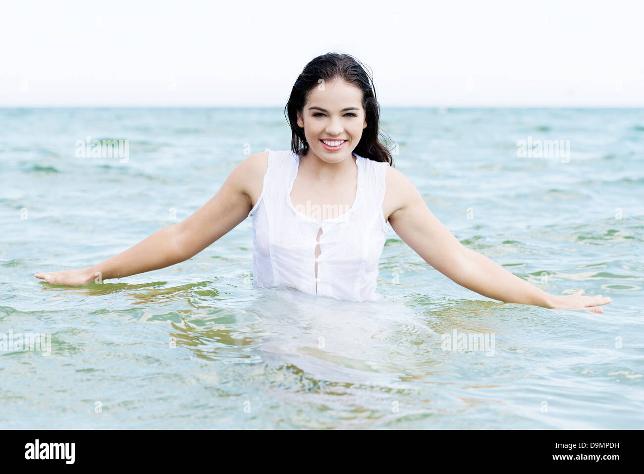 Woman in wet dress coast hi-res stock photography and images - Alamy