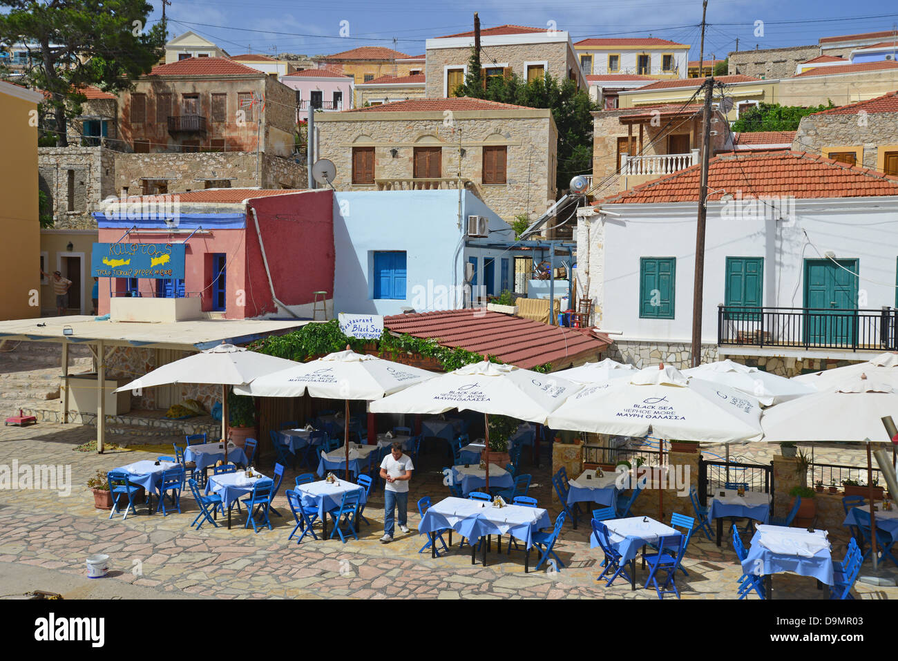Waterfront taverna, Port of Emporio, Halki (Chalki), Rhodes (Rodos ...