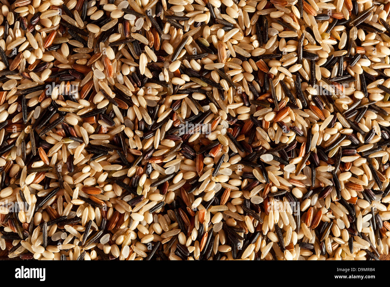 Organic Dry Multi Grain Rice against a background Stock Photo - Alamy