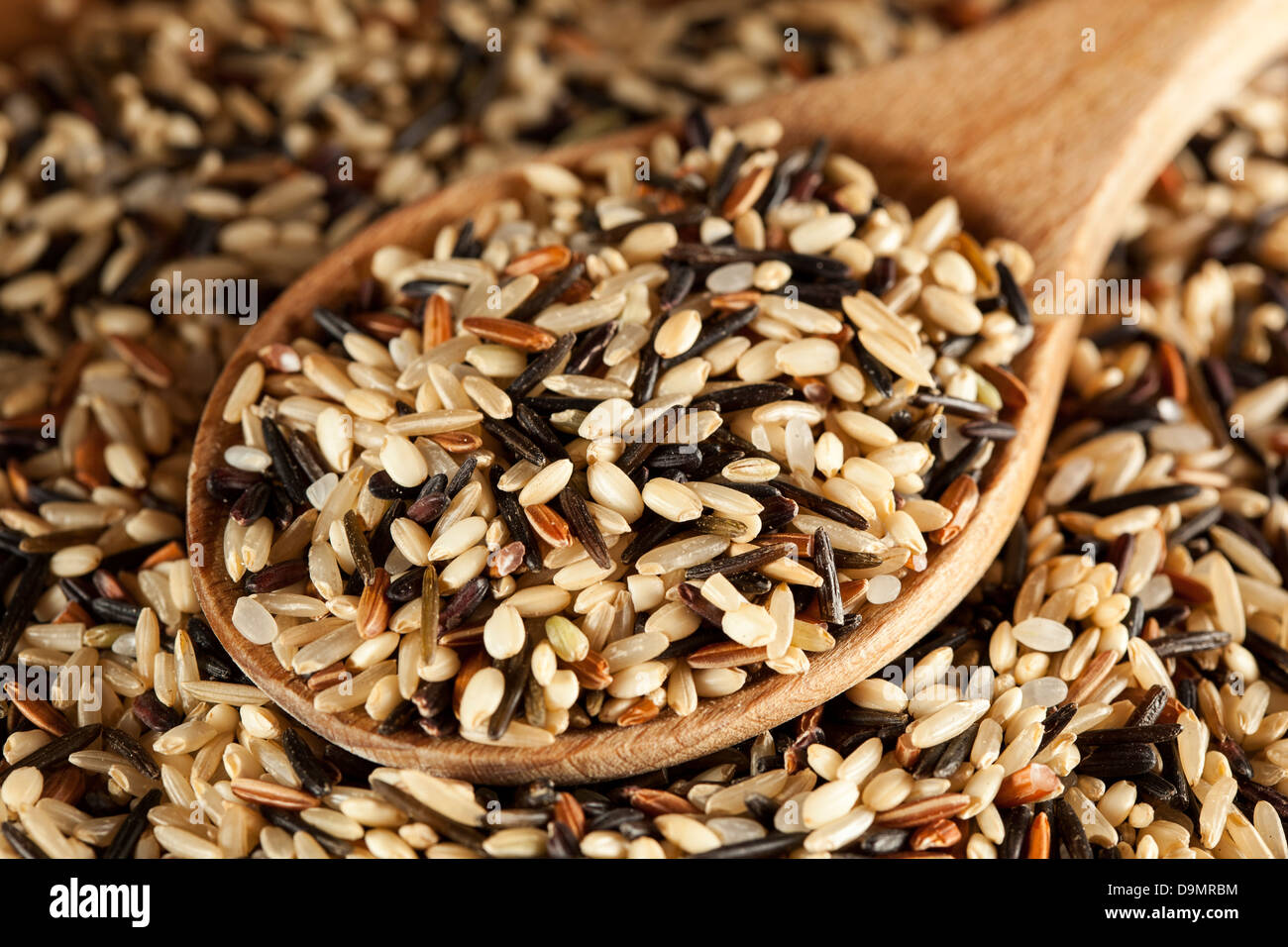Organic Dry Multi Grain Rice against a background Stock Photo - Alamy