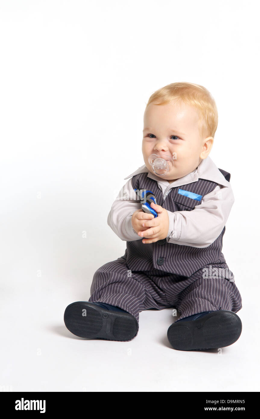 Blond baby in suit working hi-res stock photography and images - Alamy