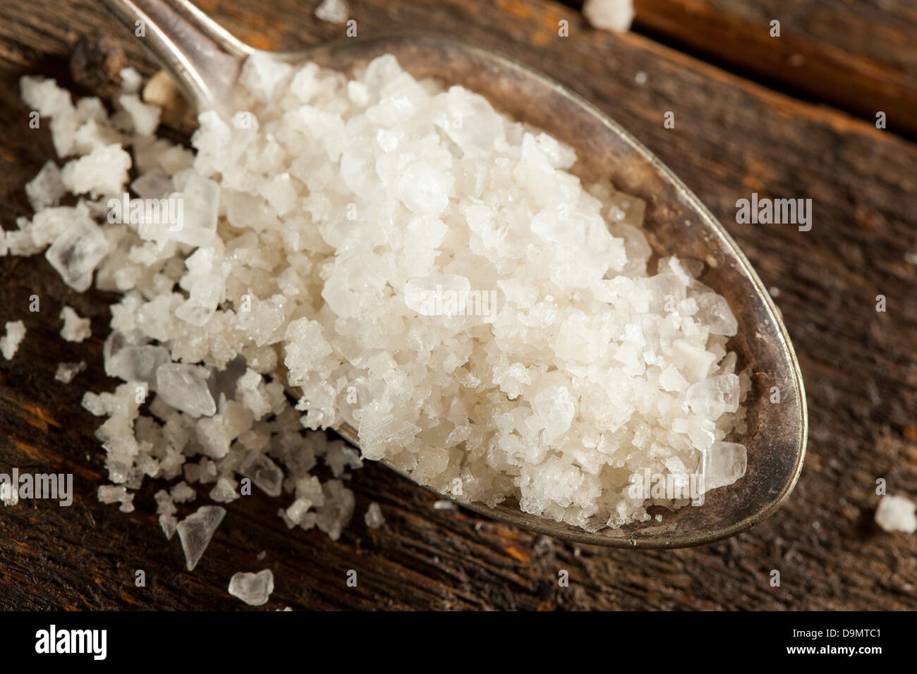 Organic Raw White Sea Salt against a background Stock Photo - Alamy