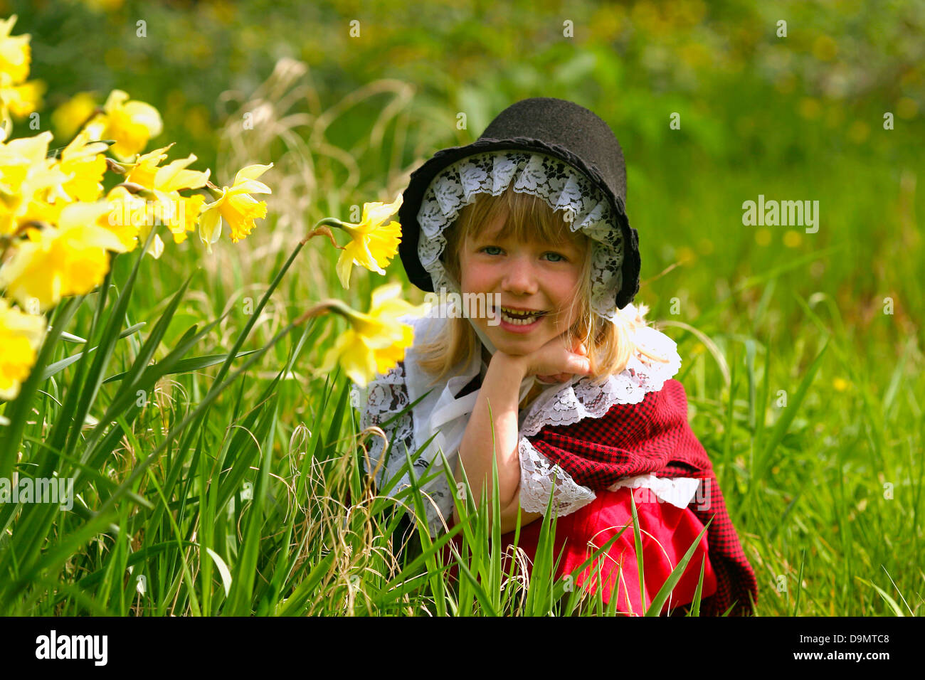 Young welsh girl in national costume/dress beside some daffodils Stock ...