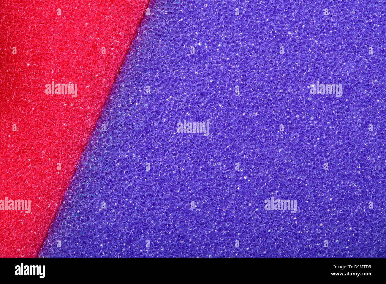 Violet red texture cellulose foam sponge background Stock Photo - Alamy