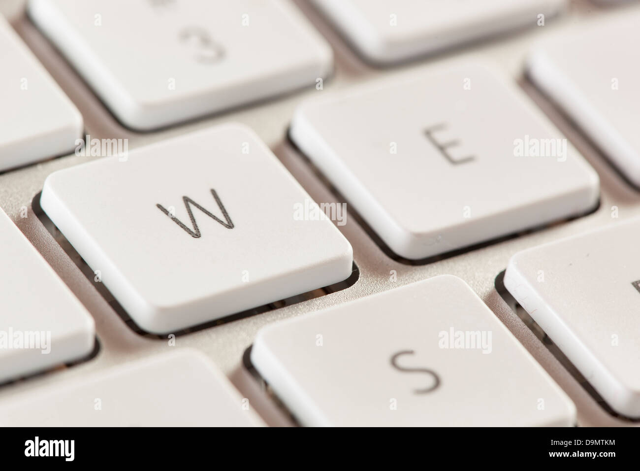 Grey Computer Keyboard with white keys for typing Stock Photo - Alamy