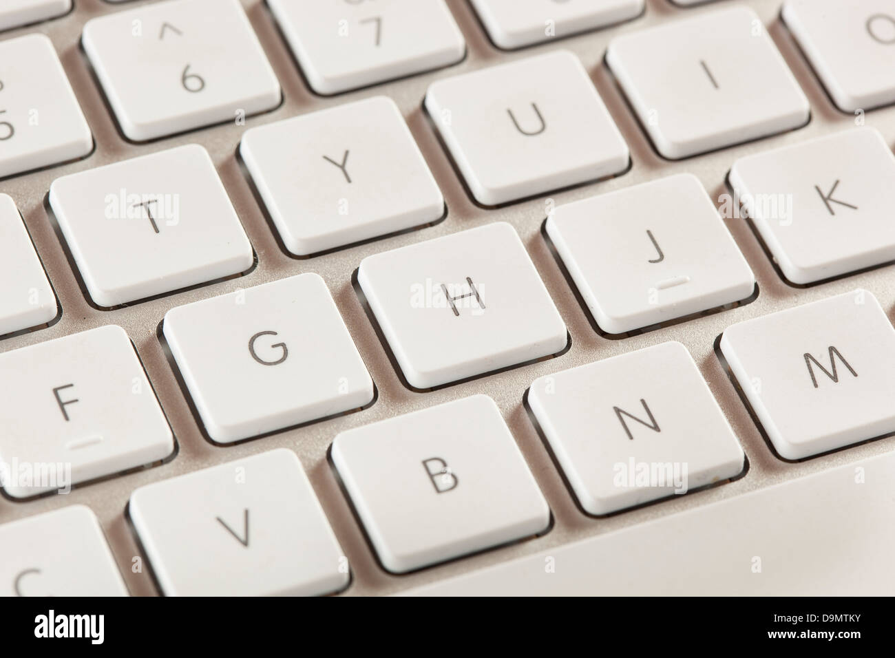 Grey Computer Keyboard with white keys for typing Stock Photo - Alamy