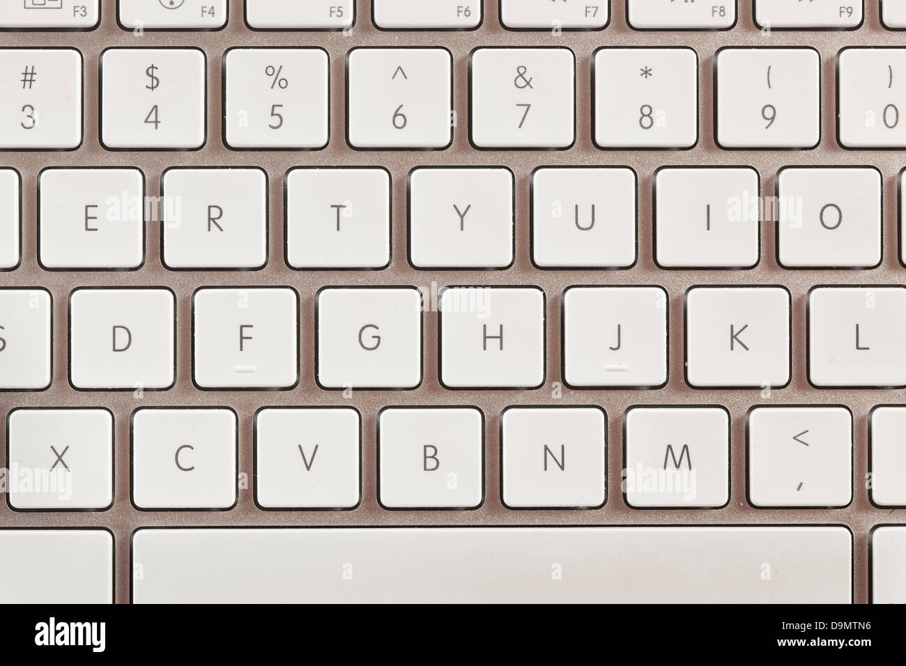 Grey Computer Keyboard with white keys for typing Stock Photo - Alamy