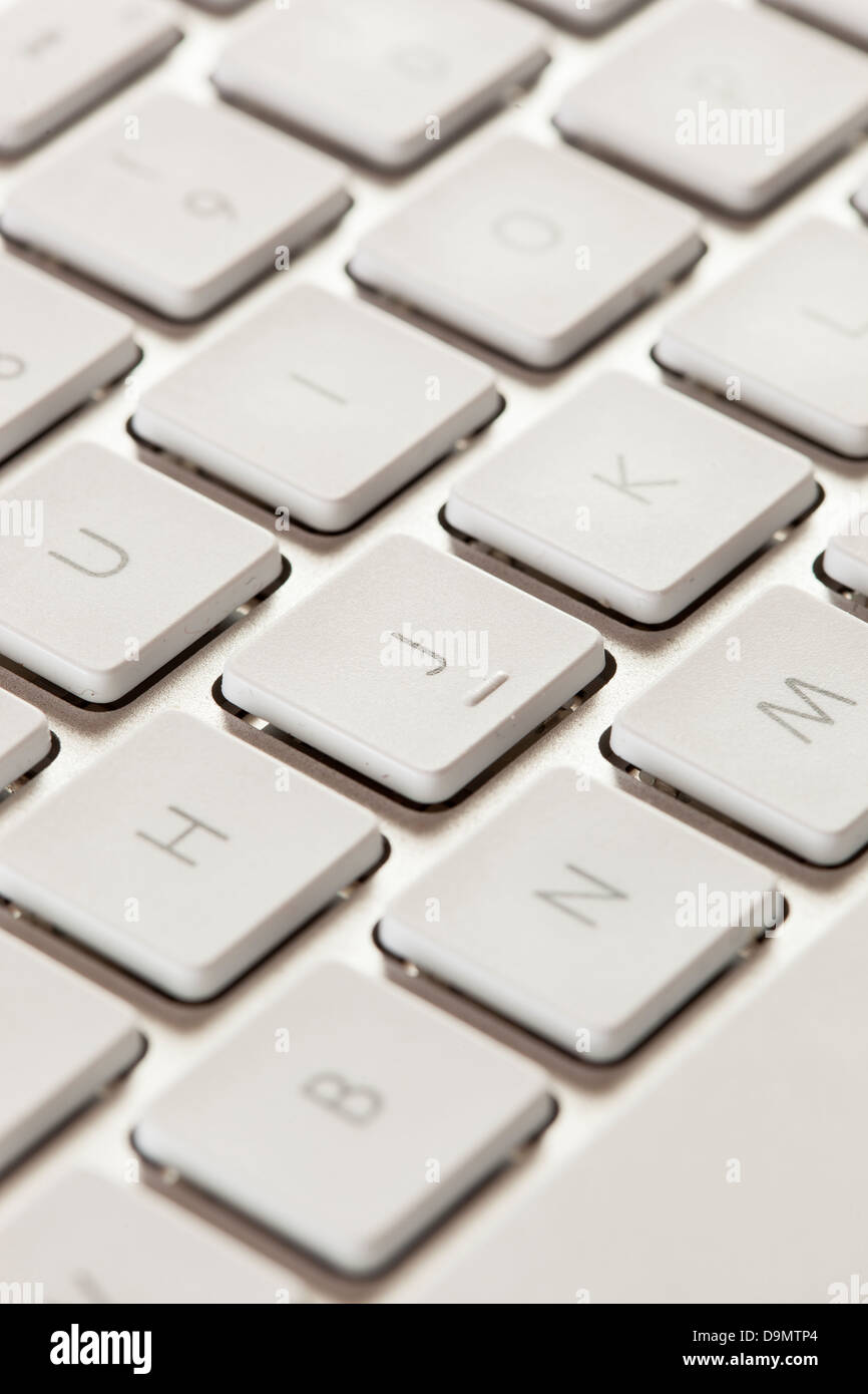 Grey Computer Keyboard with white keys for typing Stock Photo - Alamy
