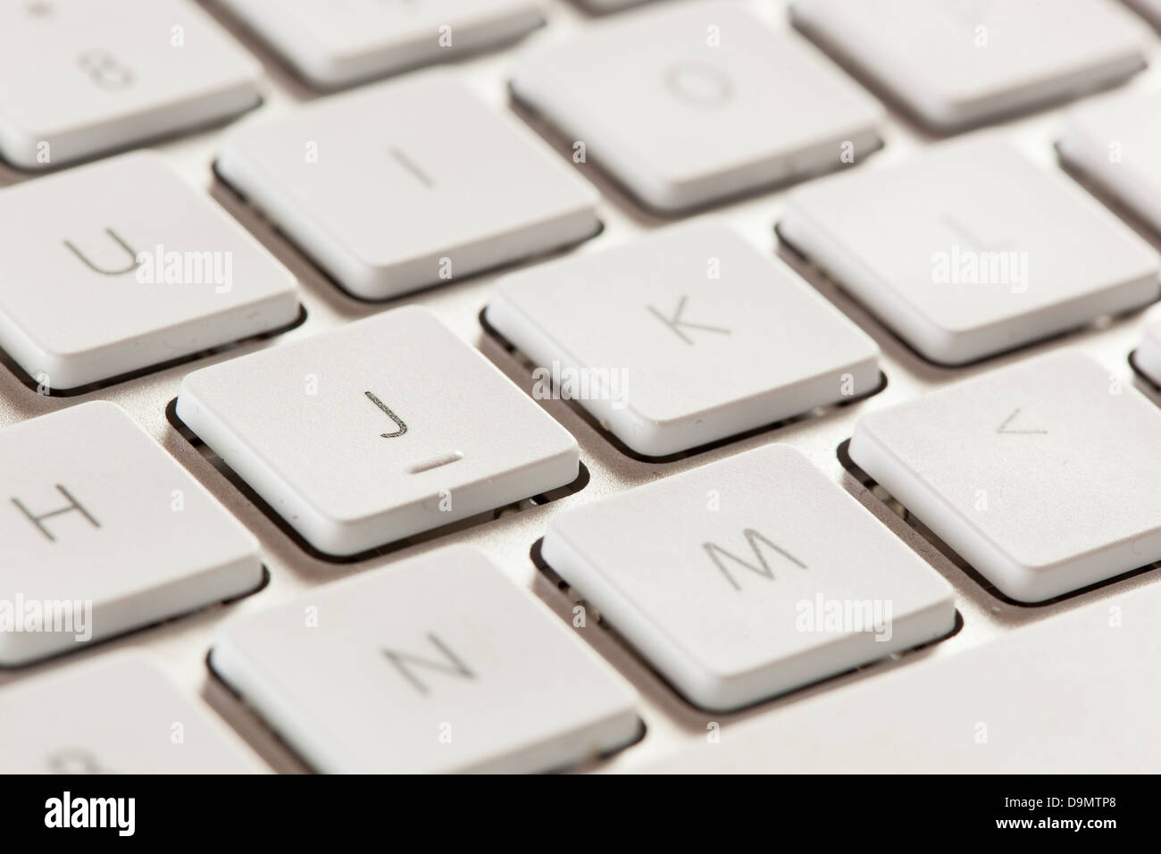 Grey Computer Keyboard with white keys for typing Stock Photo - Alamy