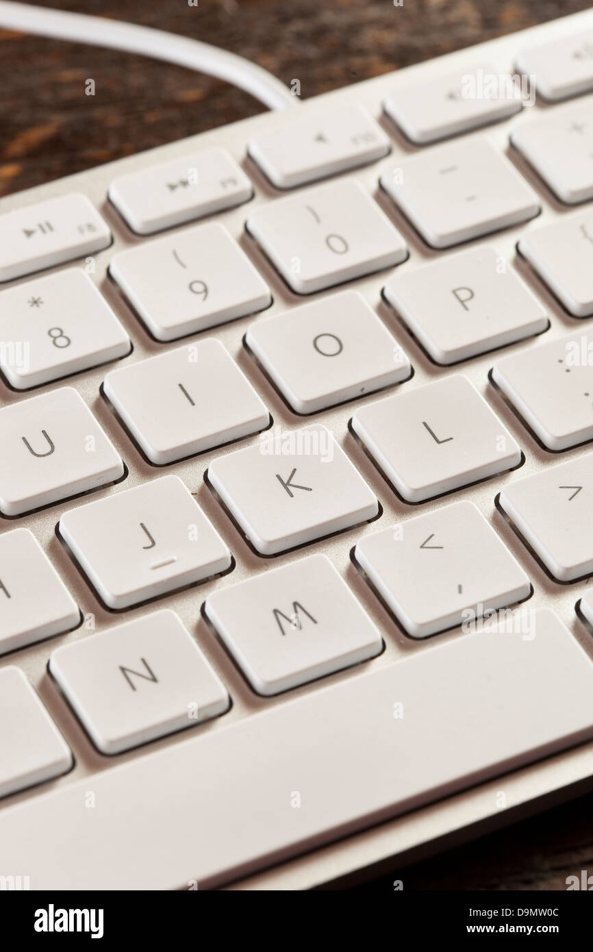 Grey Computer Keyboard with white keys for typing Stock Photo - Alamy