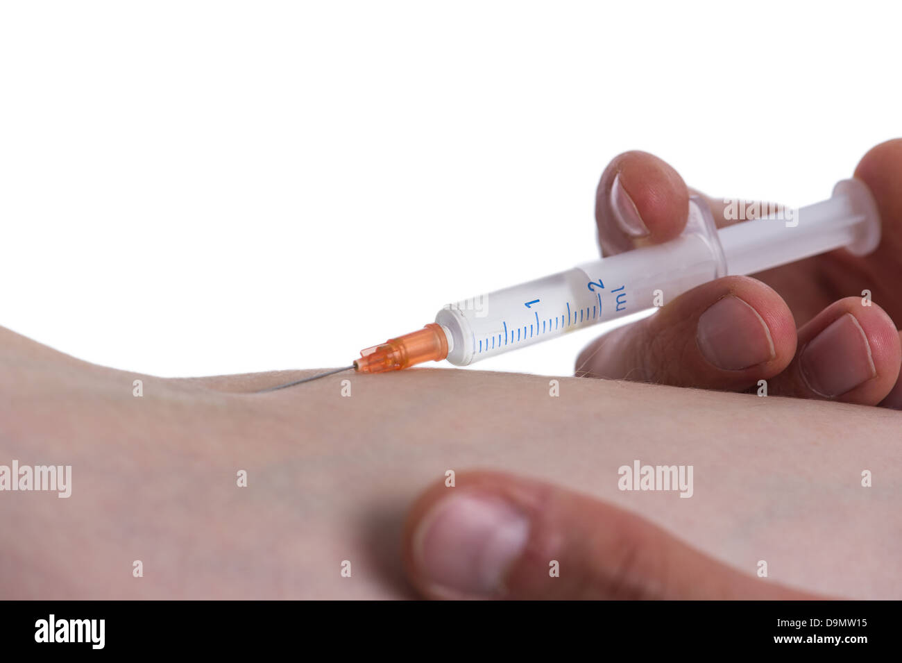Syringe in the arm (model release Stock Photo - Alamy