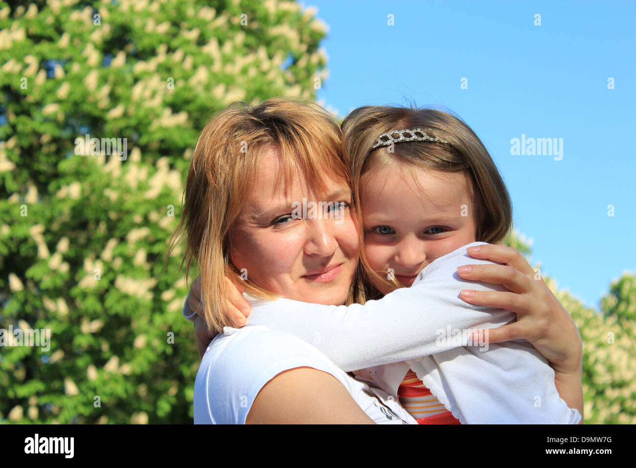 image of mother and daughter are hugging one another Stock Photo - Alamy