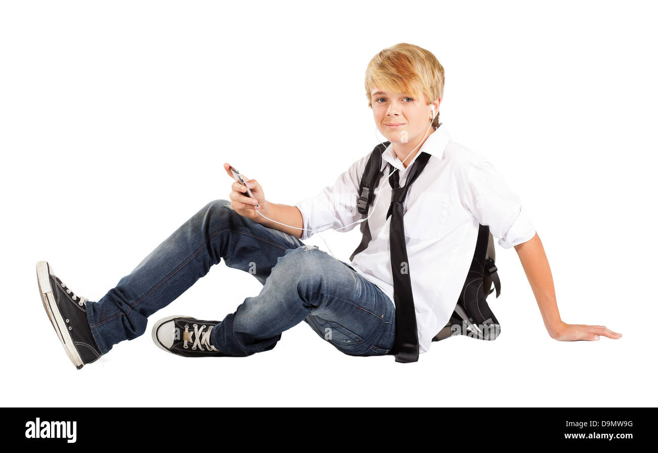 teen boy student sitting on floor isolated on white Stock Photo - Alamy