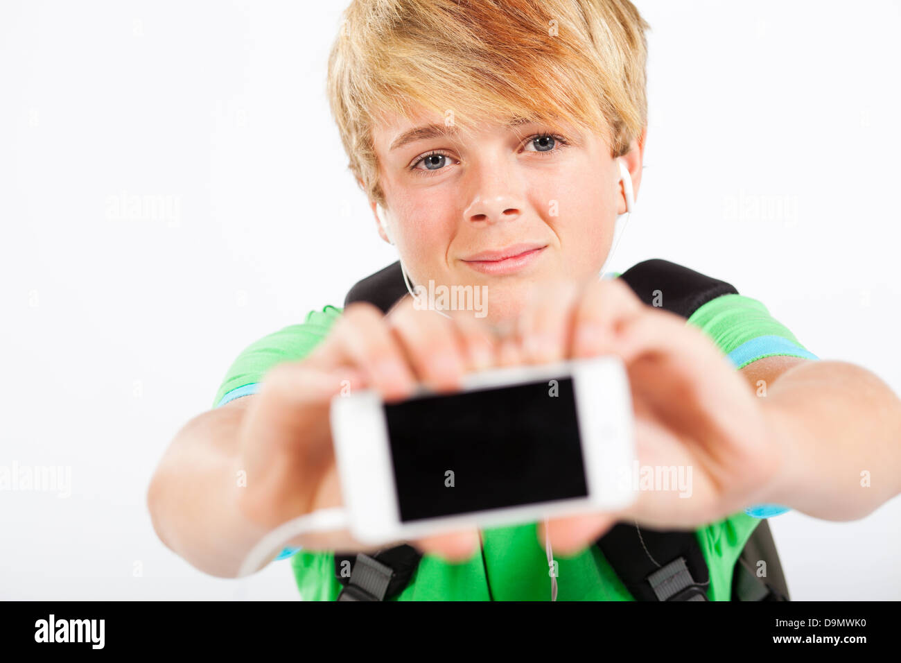 teen boy holding a smart phone towards camera Stock Photo - Alamy