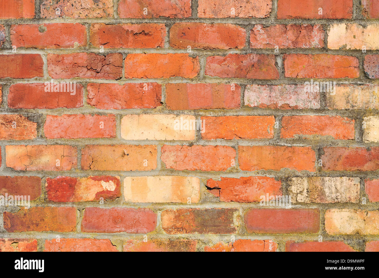 A red brick wall exposed Stock Photo - Alamy