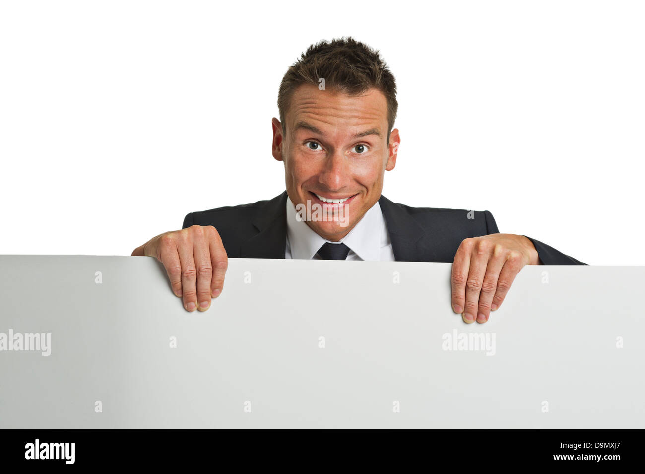 Businessman with poster (model release Stock Photo - Alamy
