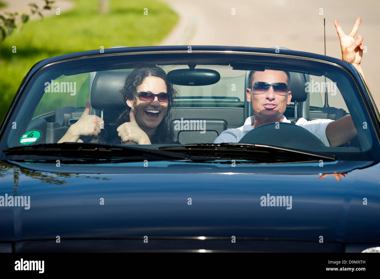 Female convertible car wind hi-res stock photography and images - Alamy