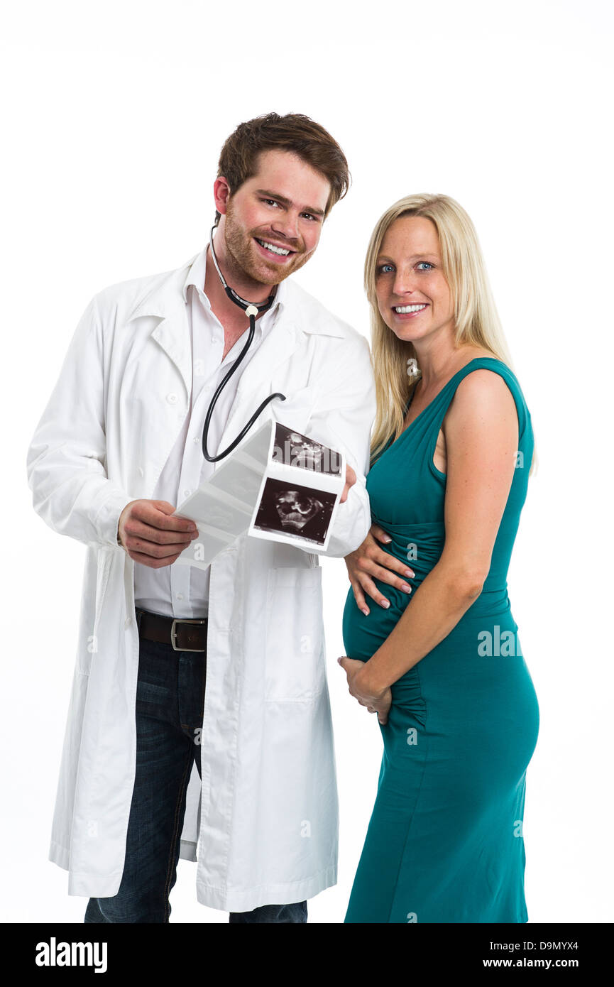 (Model release) Doctor speaks of the ultrasonic picture of the pregnant ...