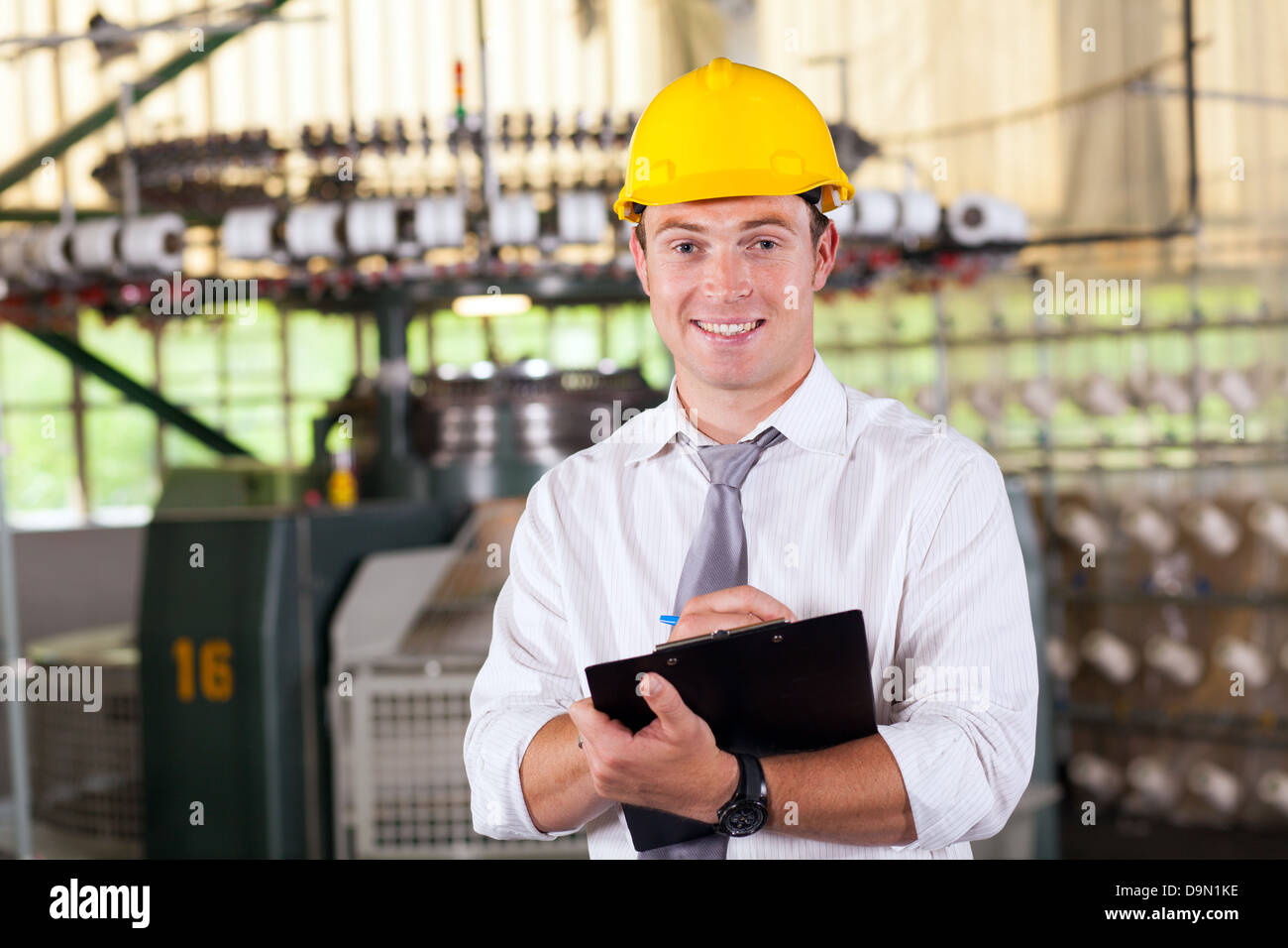 textile factory manager portrait in production area Stock Photo - Alamy