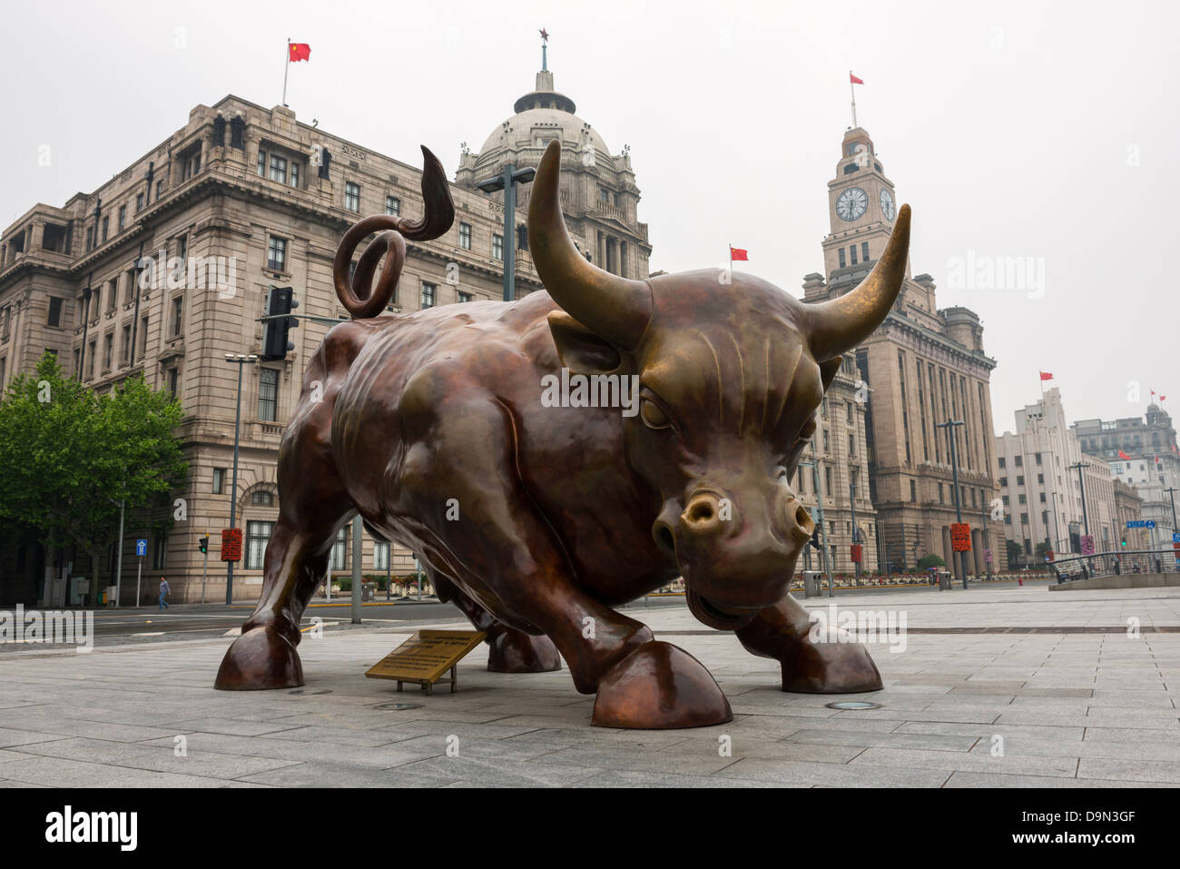 Bronze statue of a bull on the Bund Shanghai China Stock Photo - Alamy
