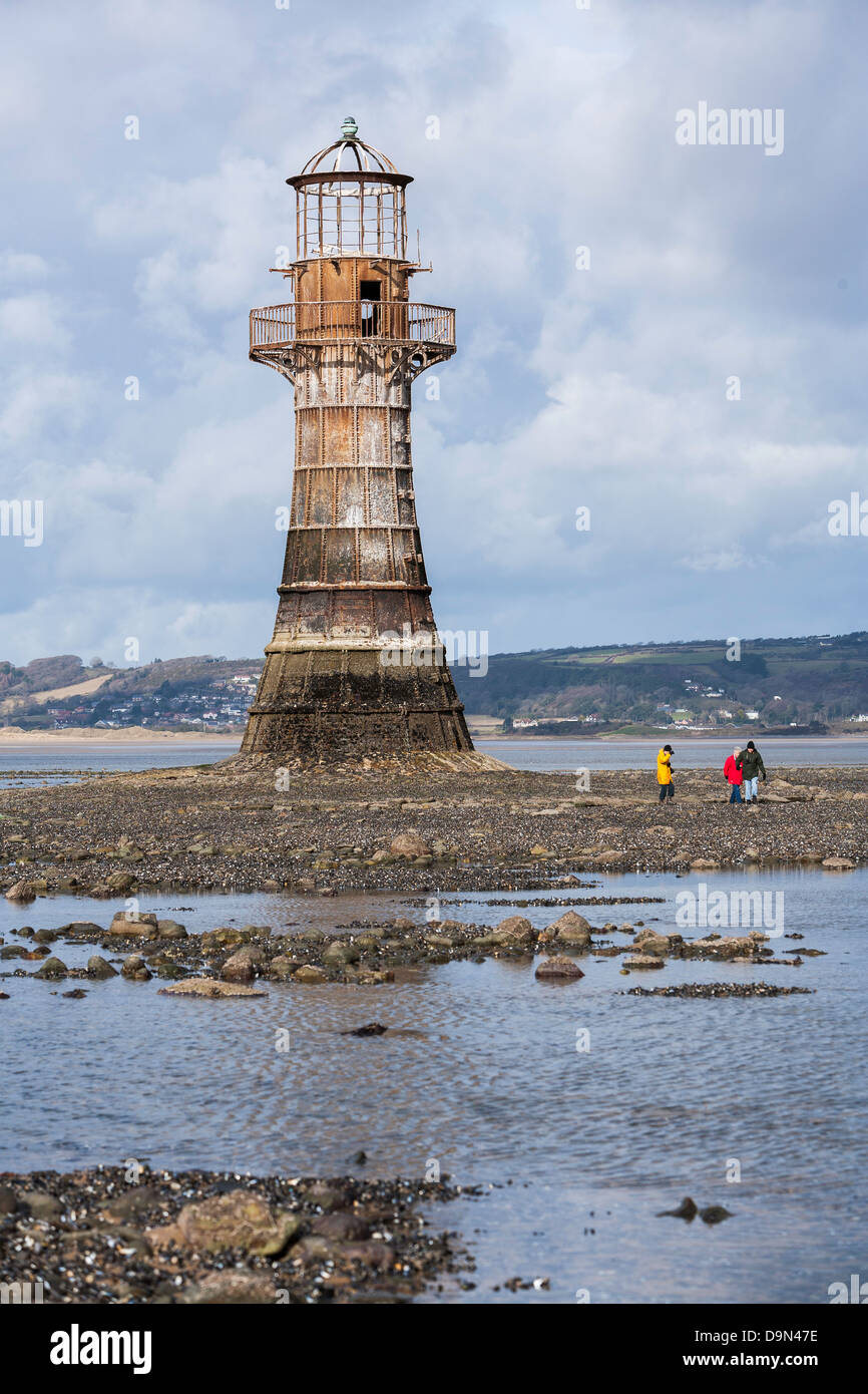Cast iron lighthouse at Whiteford Point on the Gower Peninsula opposite ...