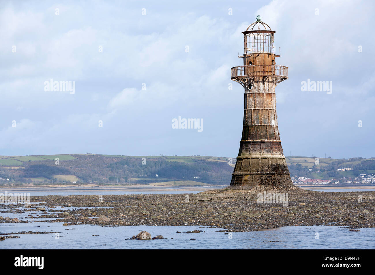 Cast iron lighthouse at Whiteford Point on the Gower Peninsula opposite ...