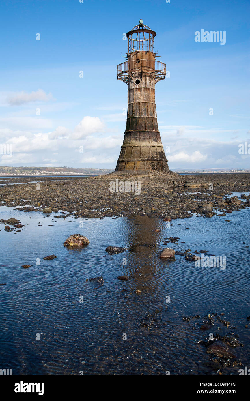 Cast iron lighthouse at Whiteford Point on the Gower Peninsula opposite ...