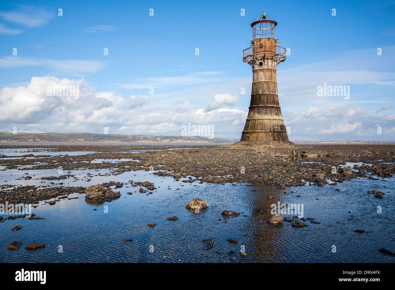 Cast iron lighthouse at Whiteford Point on the Gower Peninsula opposite ...