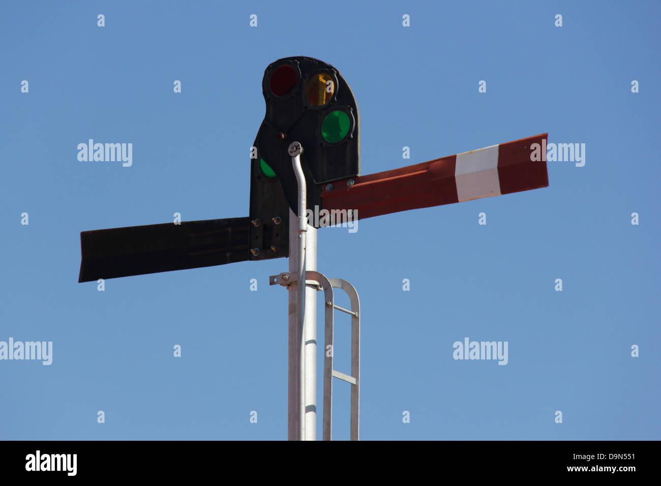 A railroad sign against a blue sky Stock Photo - Alamy