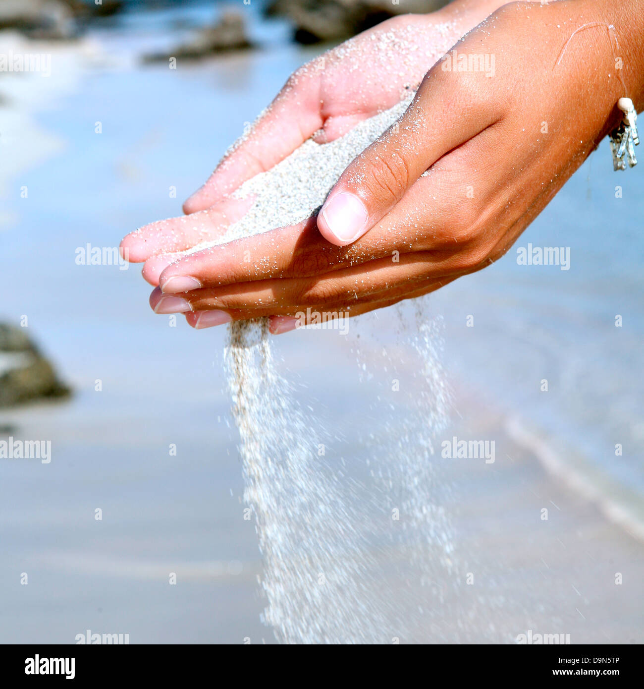 hands with sand Stock Photo - Alamy