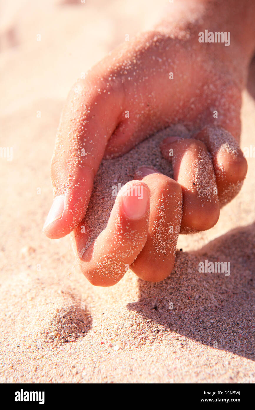 hand in the sand Stock Photo - Alamy