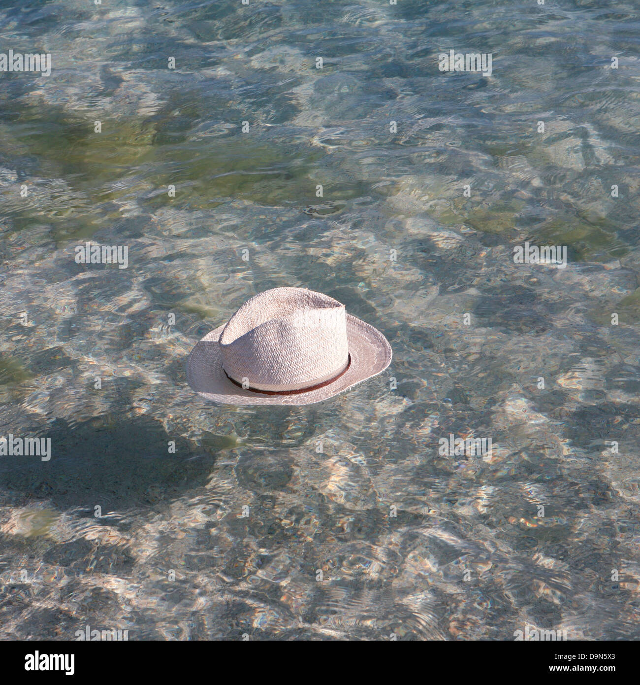 hat floating in the sea Stock Photo - Alamy