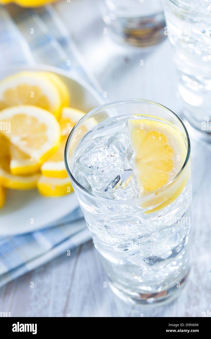 Refreshing Ice Cold Water with Lemon ready to drink Stock Photo - Alamy