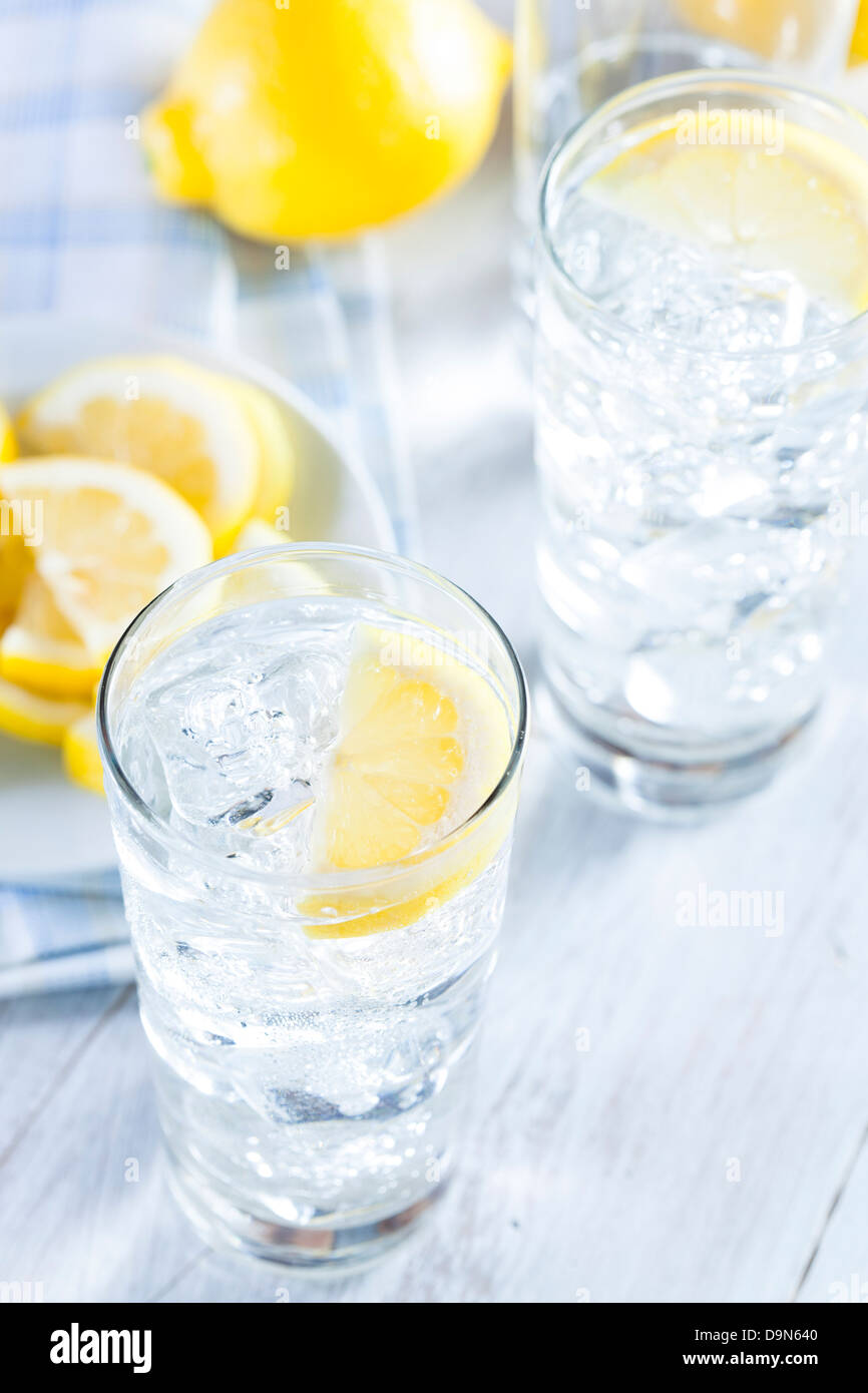Refreshing Ice Cold Water with Lemon ready to drink Stock Photo - Alamy