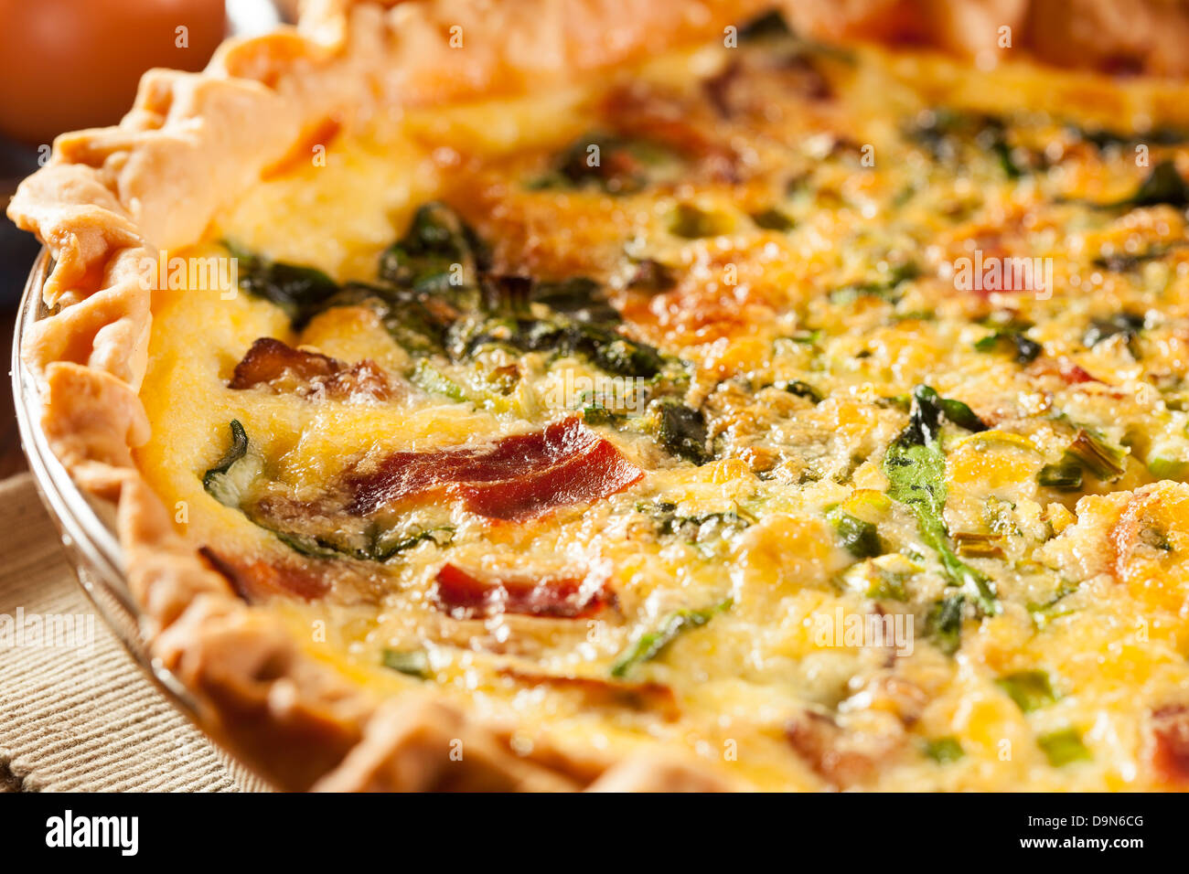 Homemade Spinach and Bacon Egg Quiche in a pie crust Stock Photo - Alamy