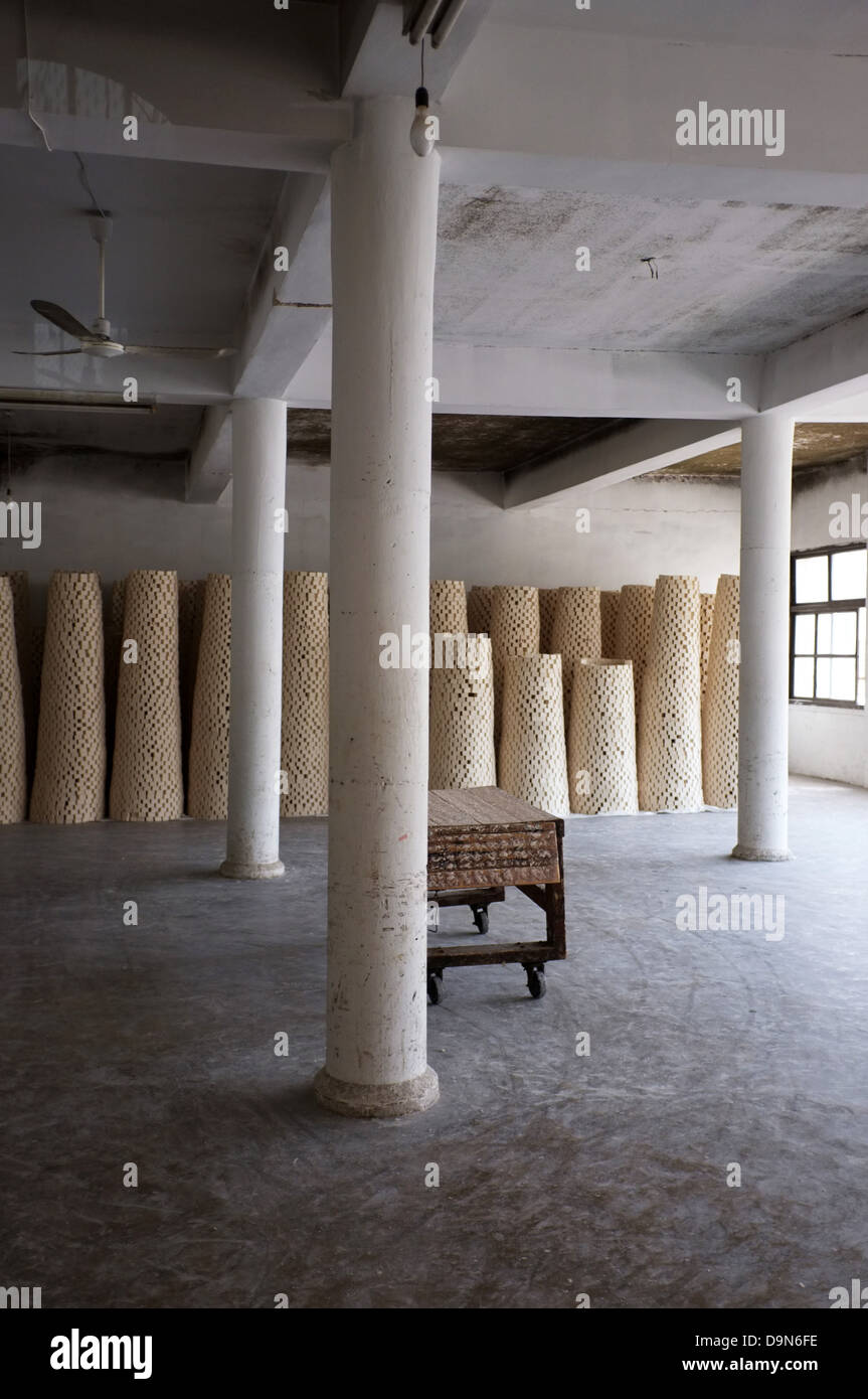 Stacks of hand-crafted olive oil soap drying in a soap factory downtown ...