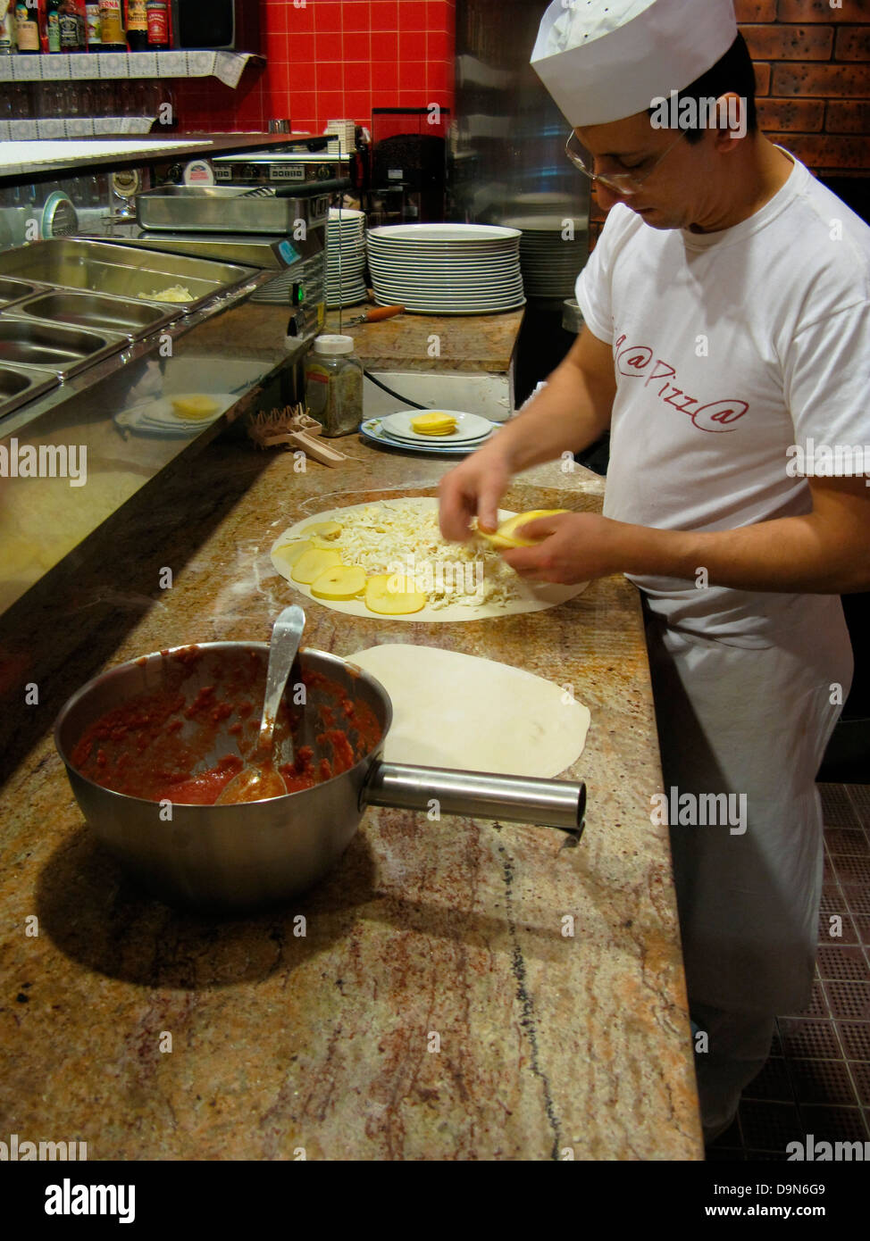 Making pizzas hi-res stock photography and images - Alamy