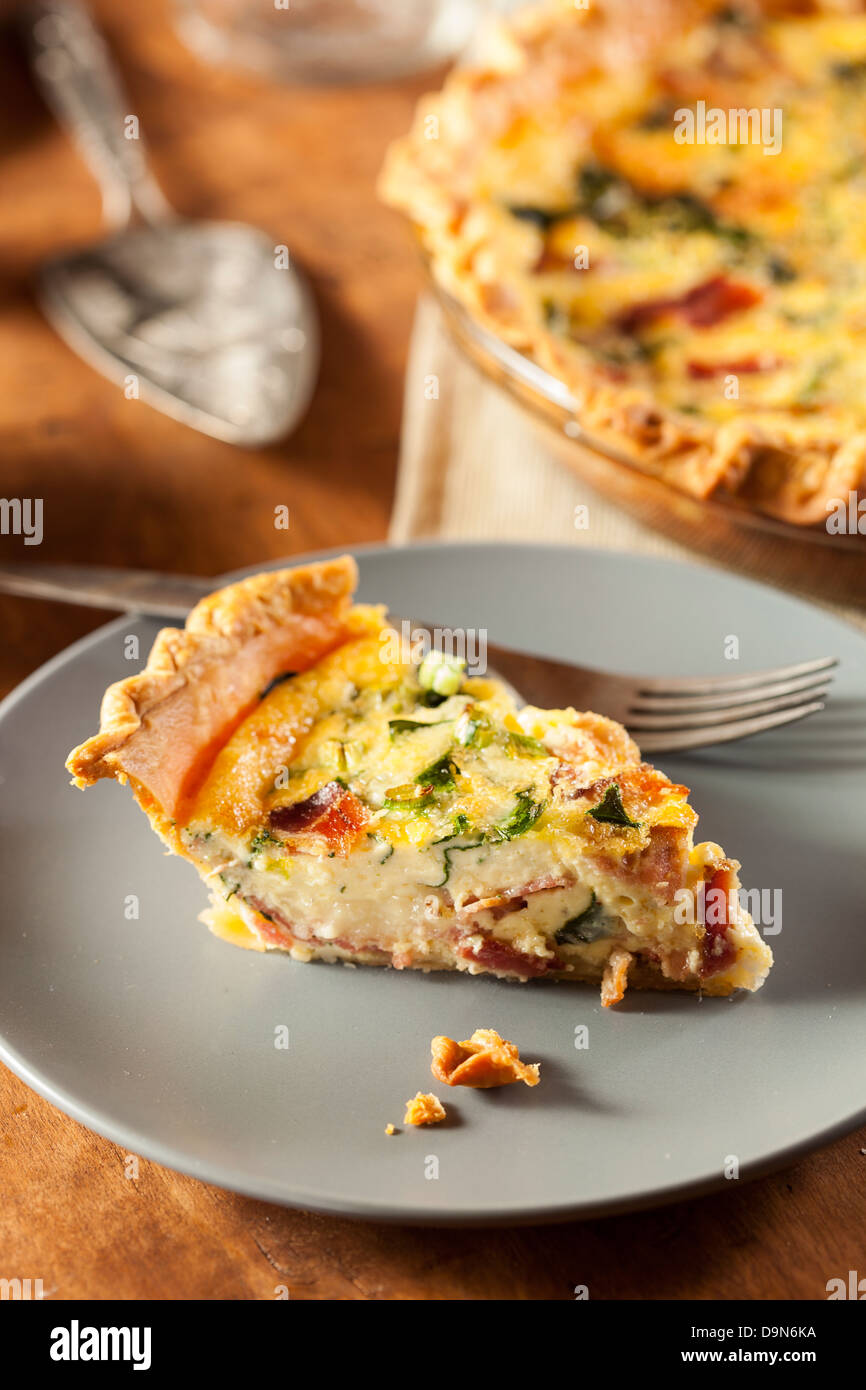 Homemade Spinach and Bacon Egg Quiche in a pie crust Stock Photo - Alamy