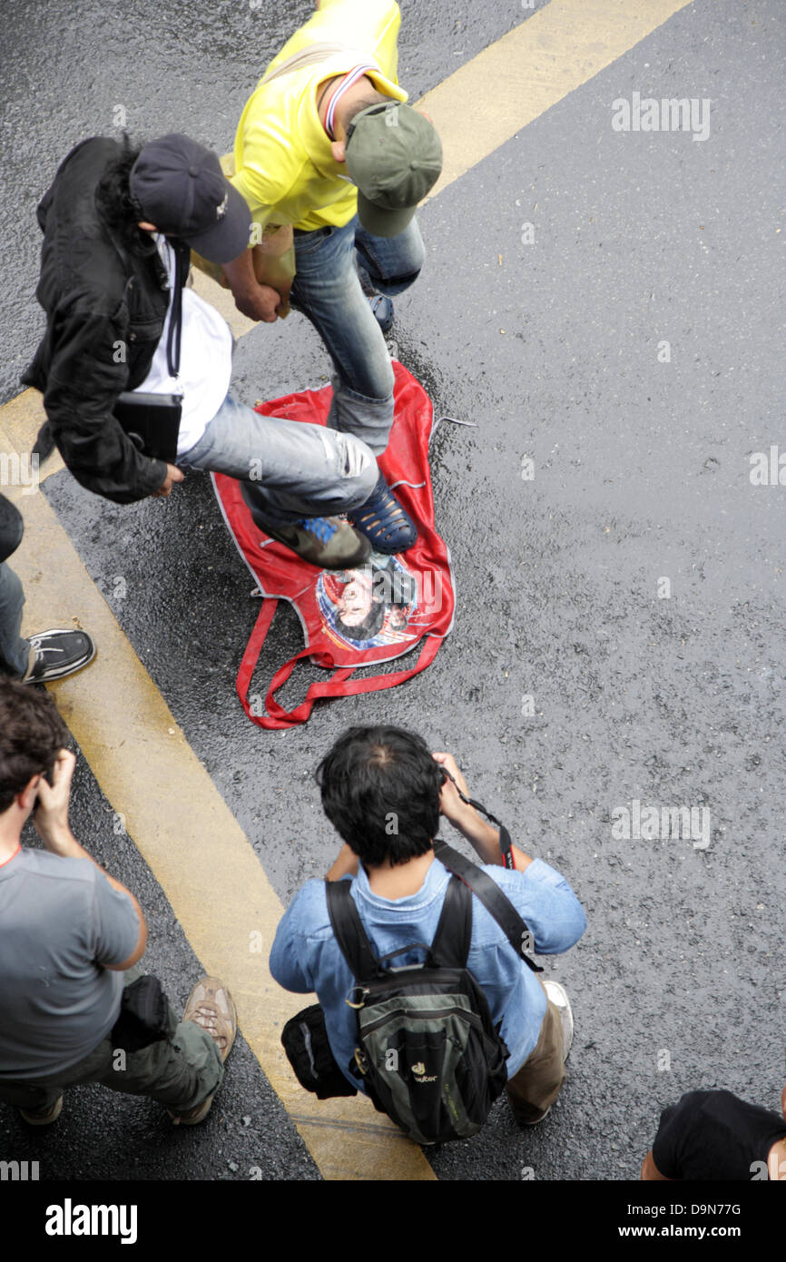 Bangkok , Thailand 23th June 2013 . Protesters stomping on Yingluck ...