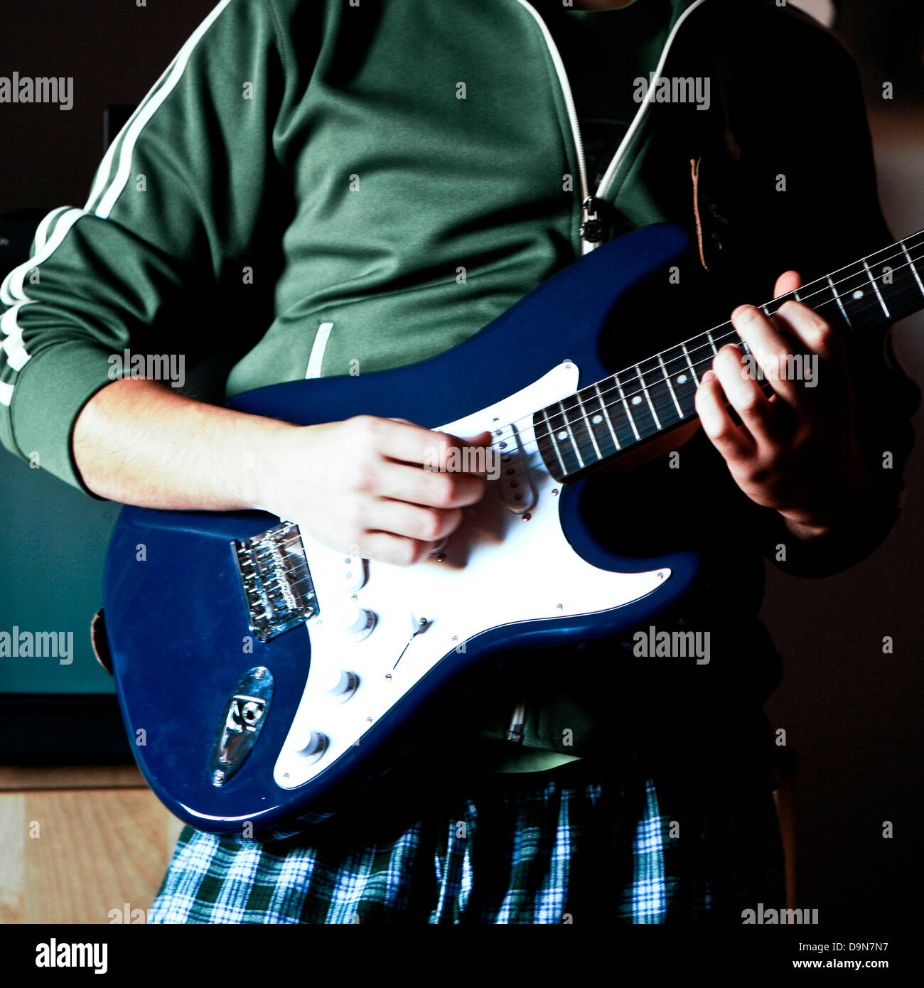 boy playing electric guitar Stock Photo - Alamy