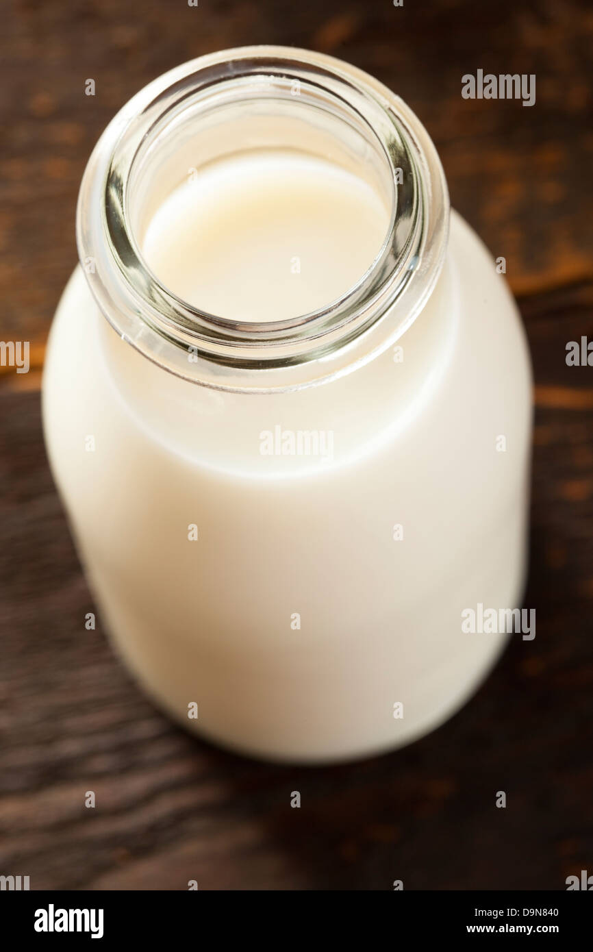 Refreshing White Cold Organic Dairy Milk in a bottle Stock Photo - Alamy