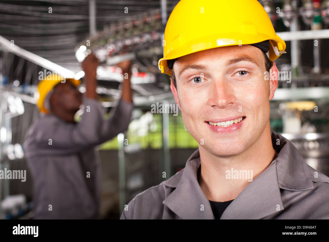 industrial worker closeup portrait in factory Stock Photo - Alamy