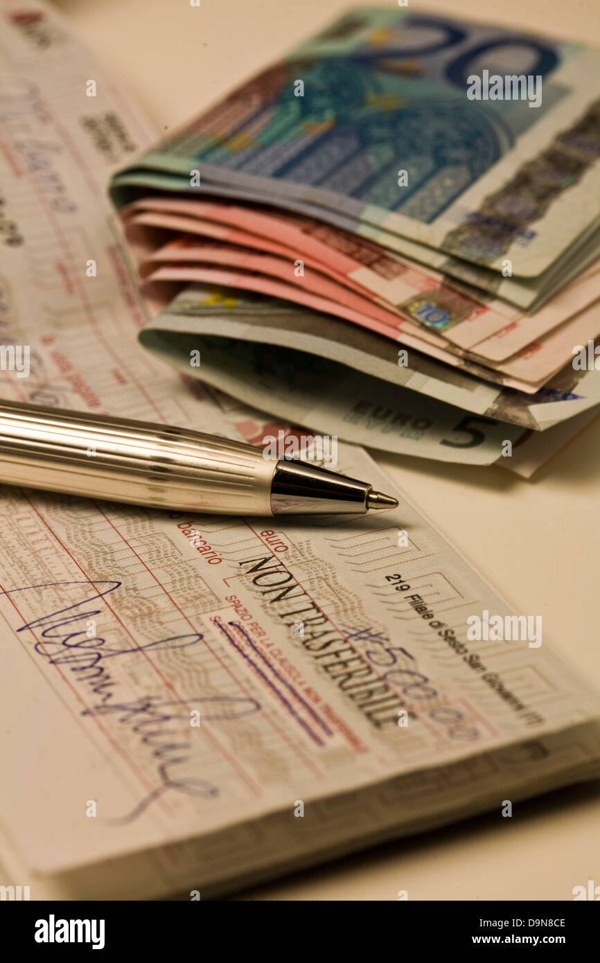 Signing cheques hi-res stock photography and images - Alamy